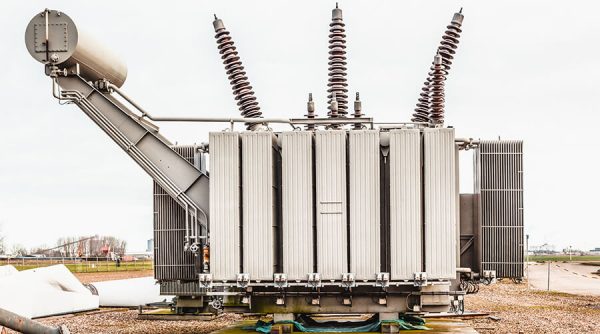 Oil immersed transformer composition and design features